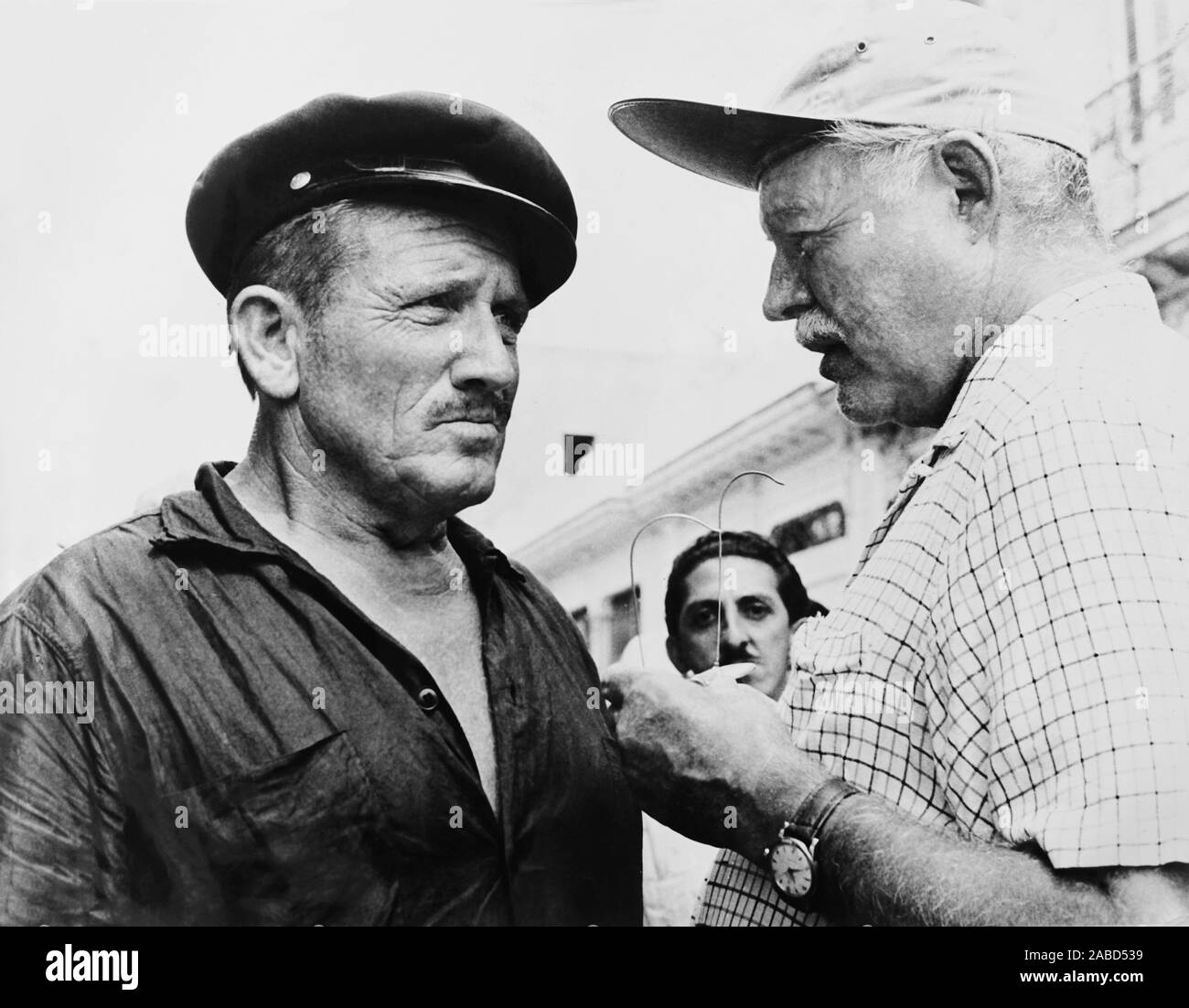 THE OLD MAN AND THE SEA, from left: Spencer Tracy, author Ernest ...