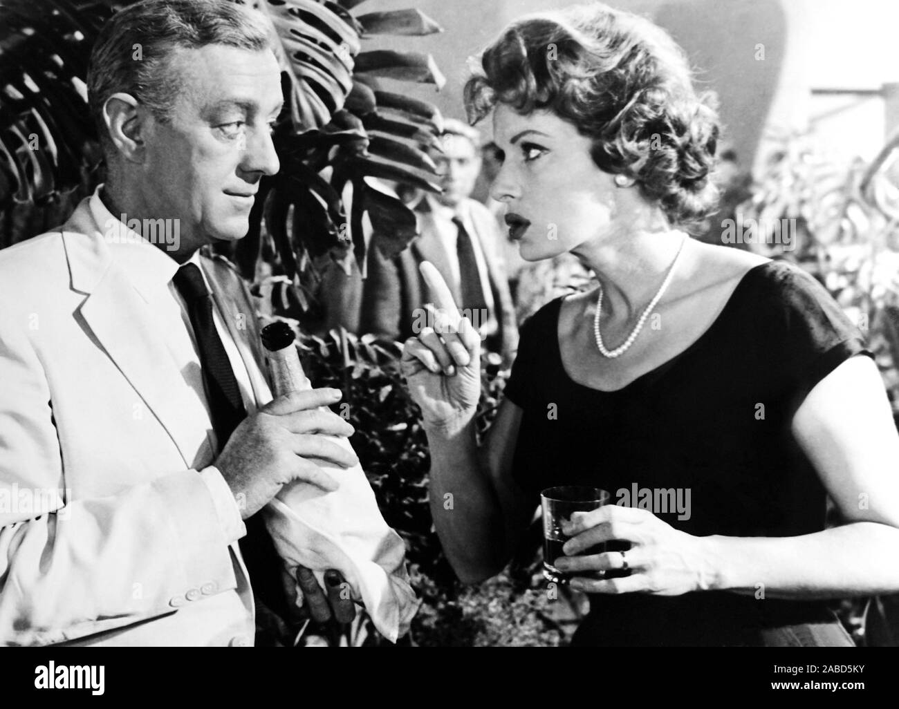 OUR MAN IN HAVANA, from left, Alec Guinness, Maureen O'Hara, 1959 Stock ...