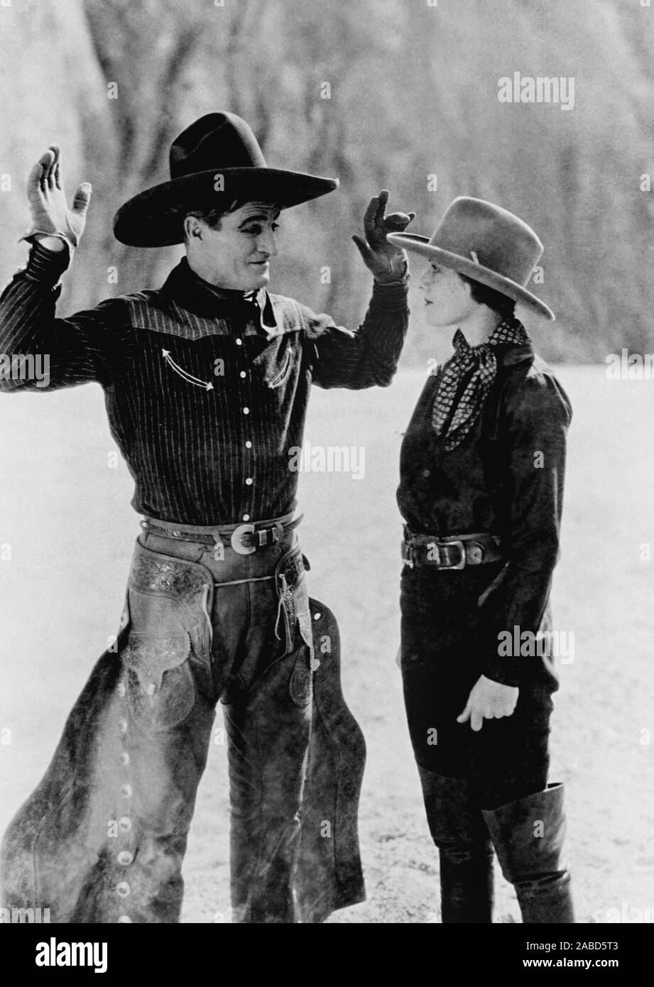 OUTLAWS OF THE RED RIVER, from left: Tom Mix, Marjorie Daw, 1927, TM ...