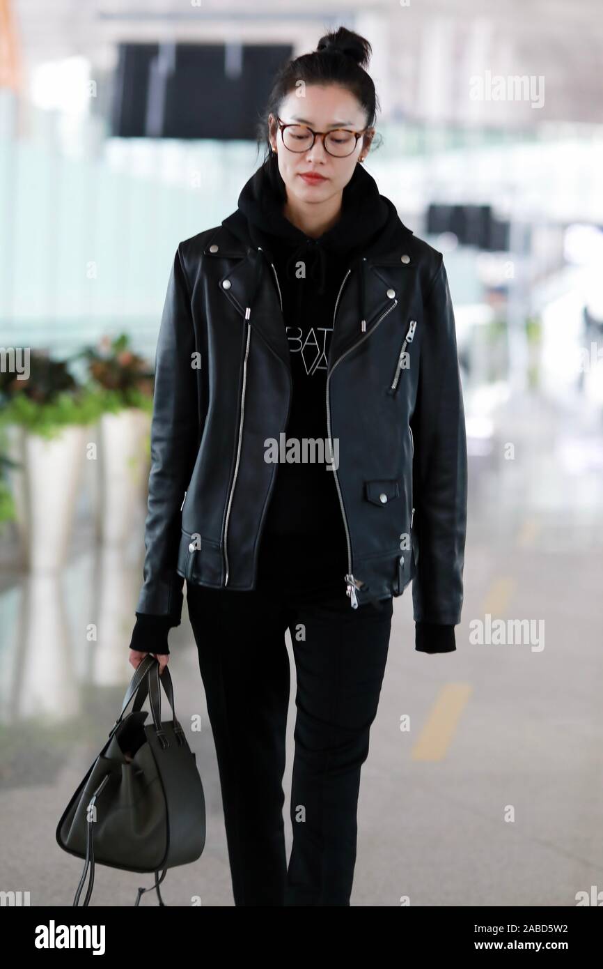 Chinese supermodel Liu Wen arrives at a Beijing airport before ...