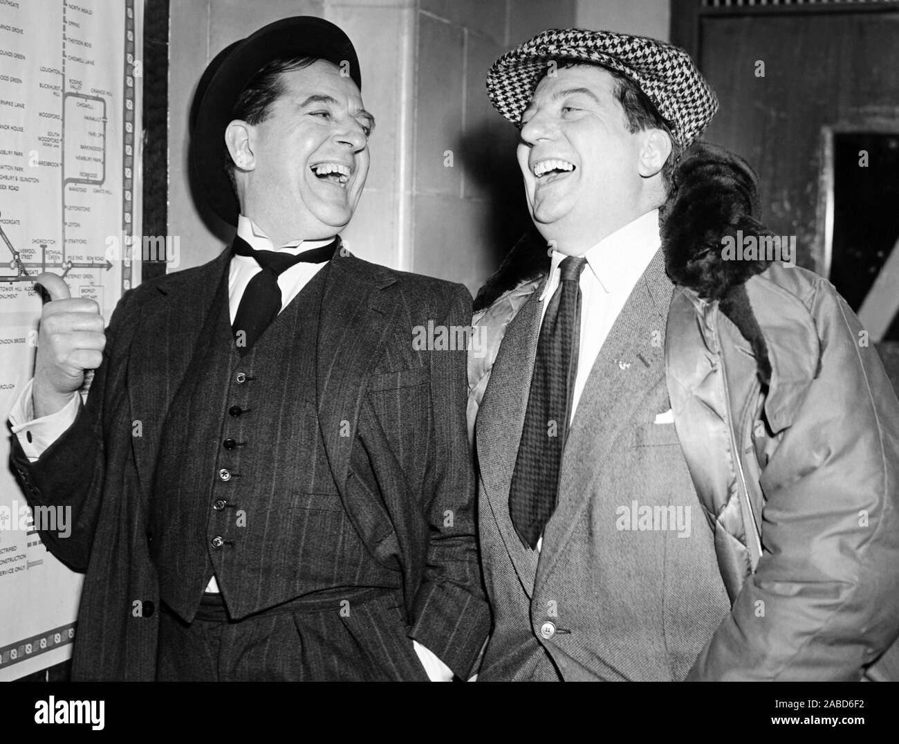 THE PERFECT WOMAN, Sid Field, right, visiting Stanley Holloway, on-set ...