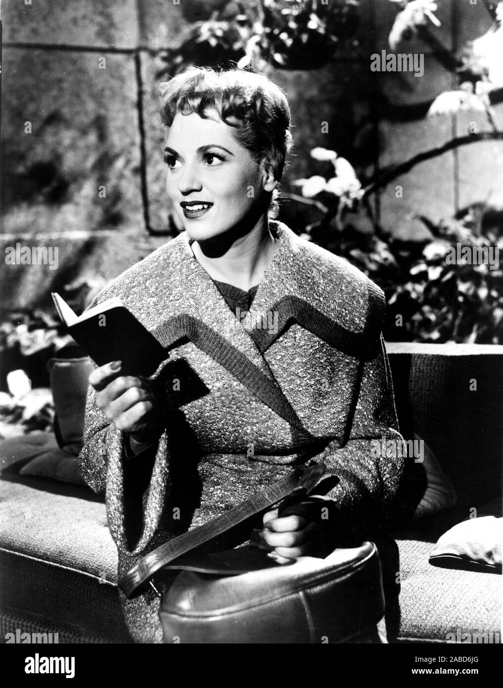 PHFFFT, Judy Holliday (in a coat by Jean Louis), 1954 Stock Photo - Alamy