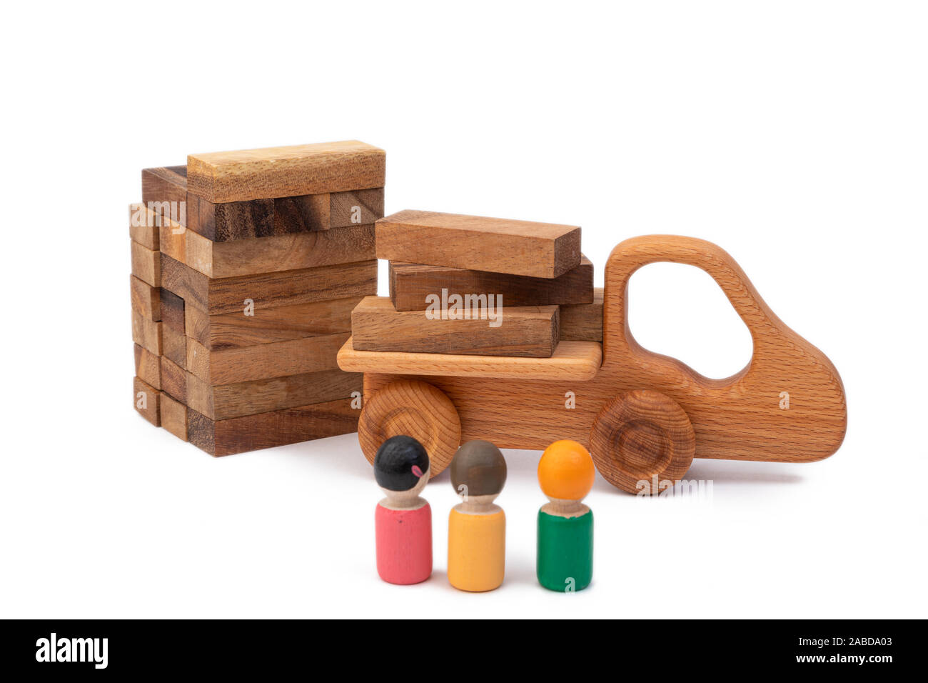 The wooden toy of the truck brought the building material in the form ...