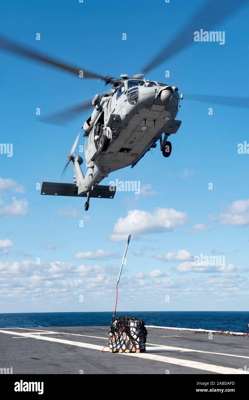 191125-N-RQ450-0116 ATLANTIC OCEAN (Nov. 25, 2019) An MH-60S Sea Hawk ...
