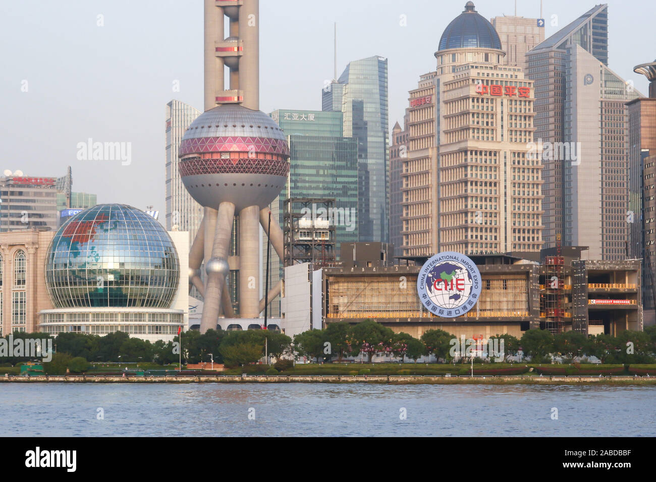 A large emblem of China International Import Expo shows up at the Bund ...