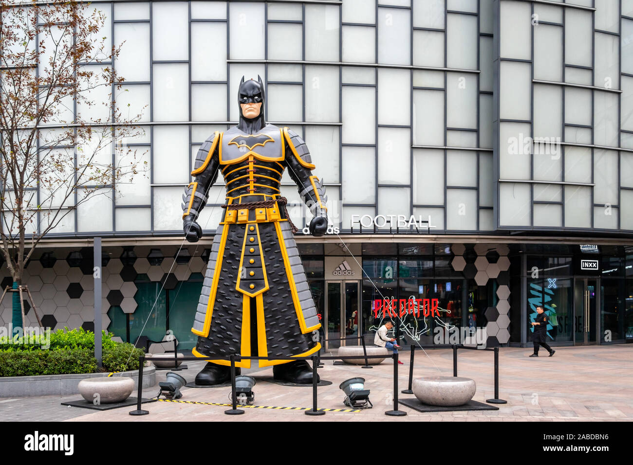 An eight-meter-high sculpture of fictional superhero Batman appears to ...