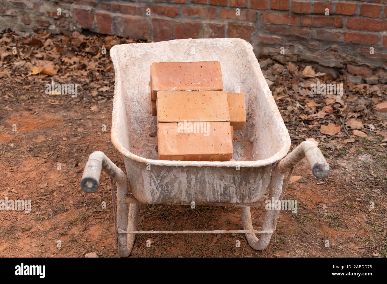 Close up picture of construction site. Bricks in a wheelbarrow Stock ...