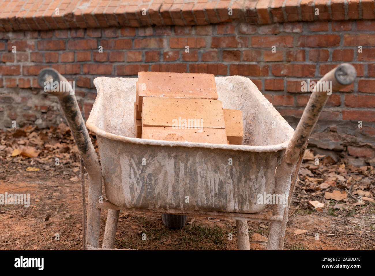 Close up picture of construction site. Bricks in a wheelbarrow Stock ...