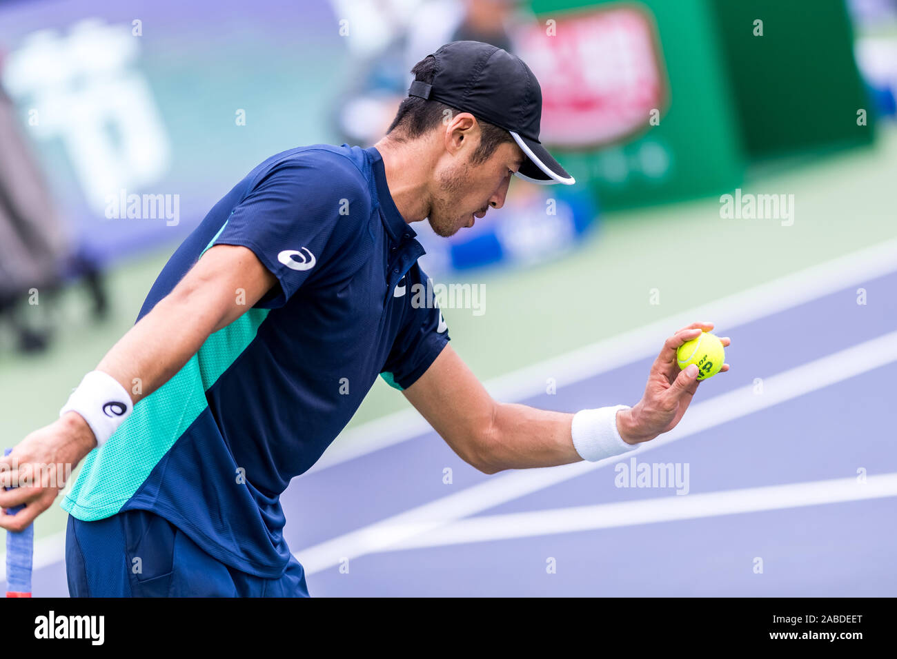 Chinese professional tennis player Li Zhe competes against French ...