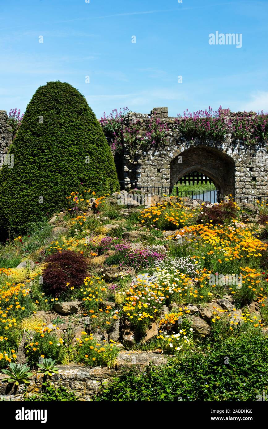 Leeds Castle barbican gate & summer garden. Portcullis / iron grille ...