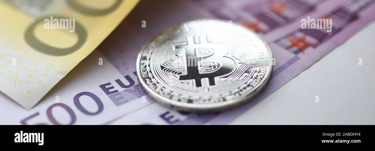 Banknotes and coins Stock Photo - Alamy