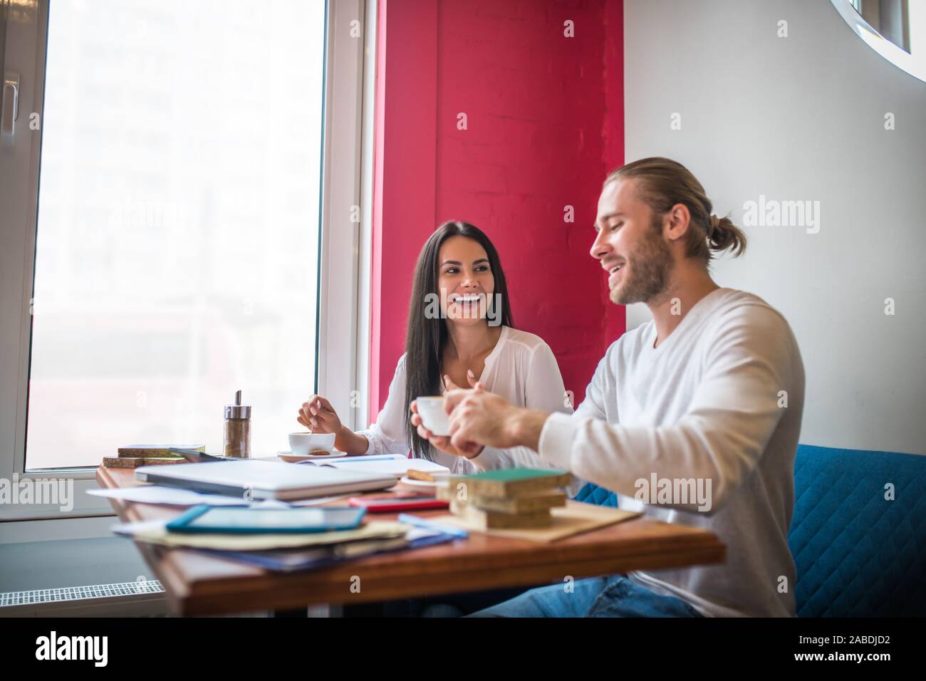 Wife enjoying her time with husband while drinking coffee Stock Photo ...