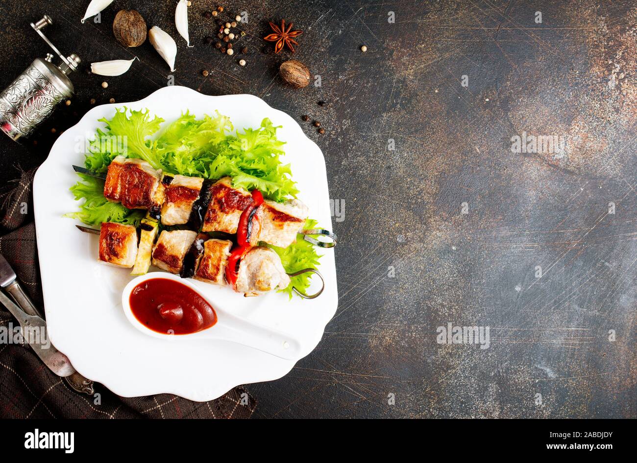meat kebab with salad leaf and ketchup Stock Photo - Alamy