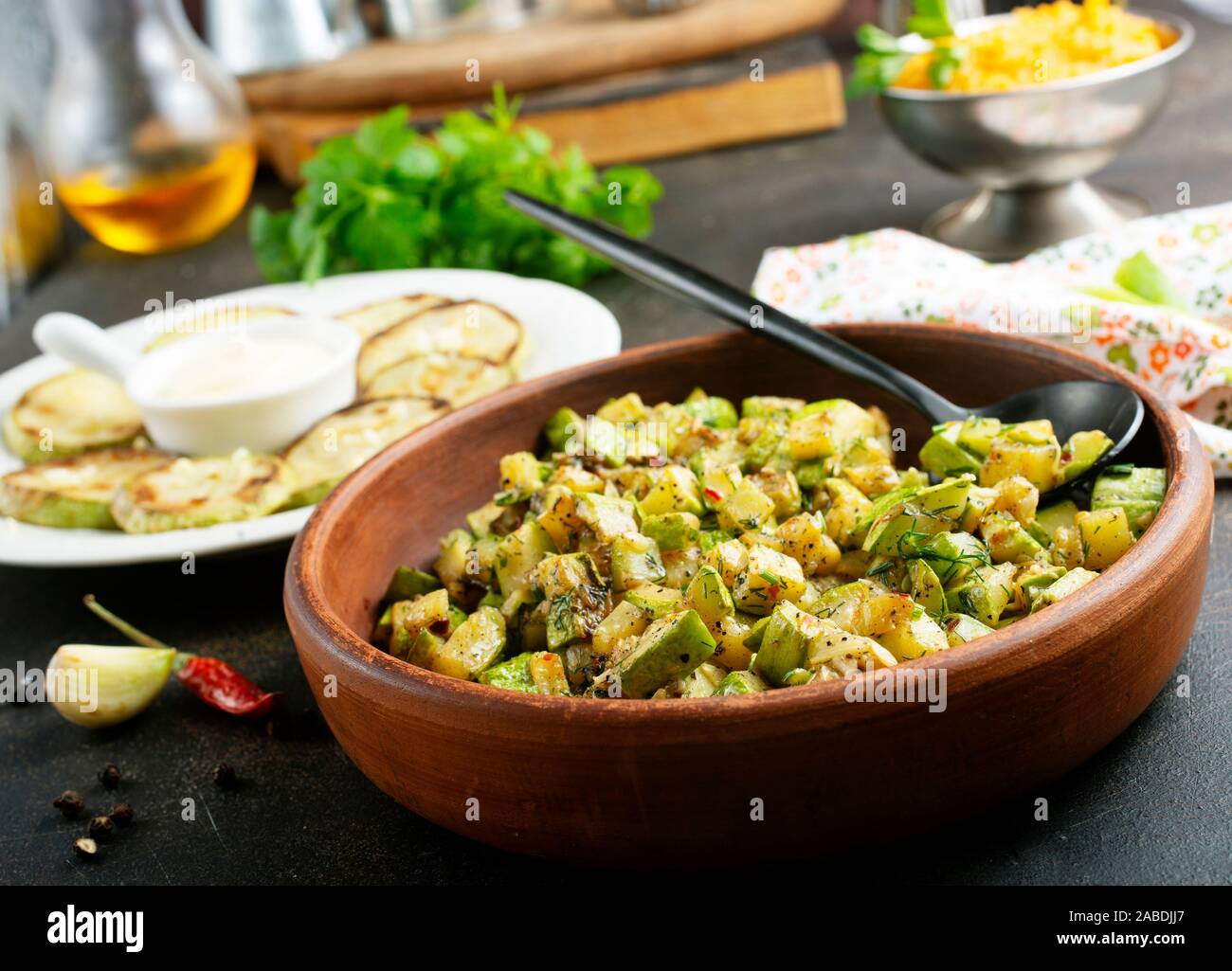 fried marrow or zucchini and caviar in bowl Stock Photo - Alamy