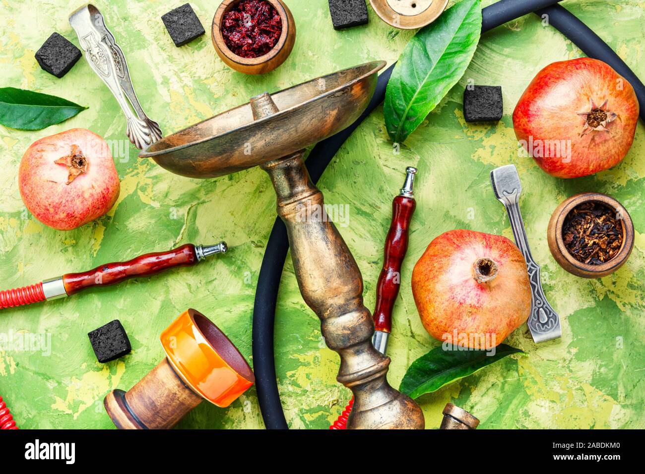 Arabic smoking hookah.Pomegranate flavor hookah.Fruit tobacco shisha ...