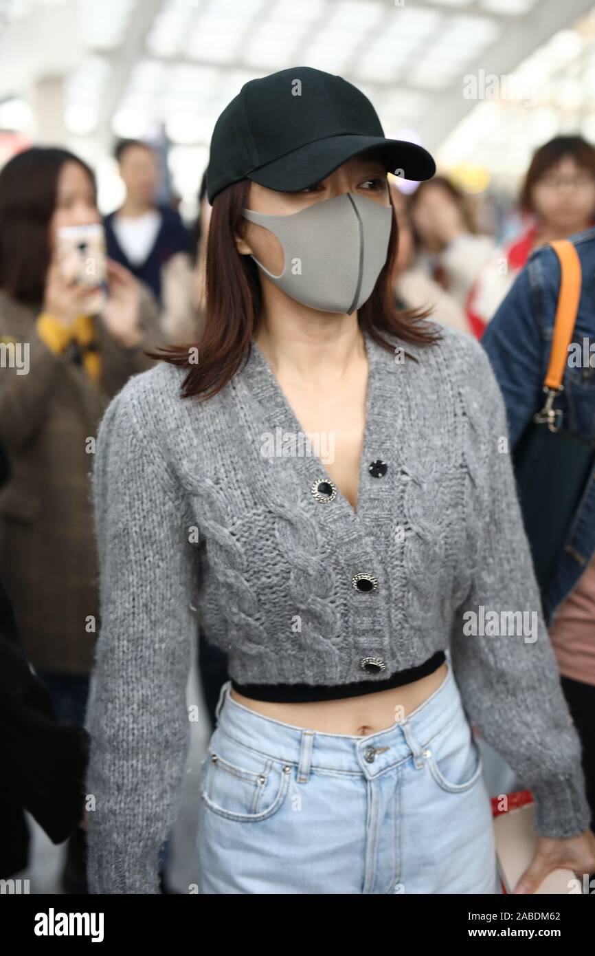 Chinese actress, model, and singer Qin Lan arrives at a Beijing airport ...
