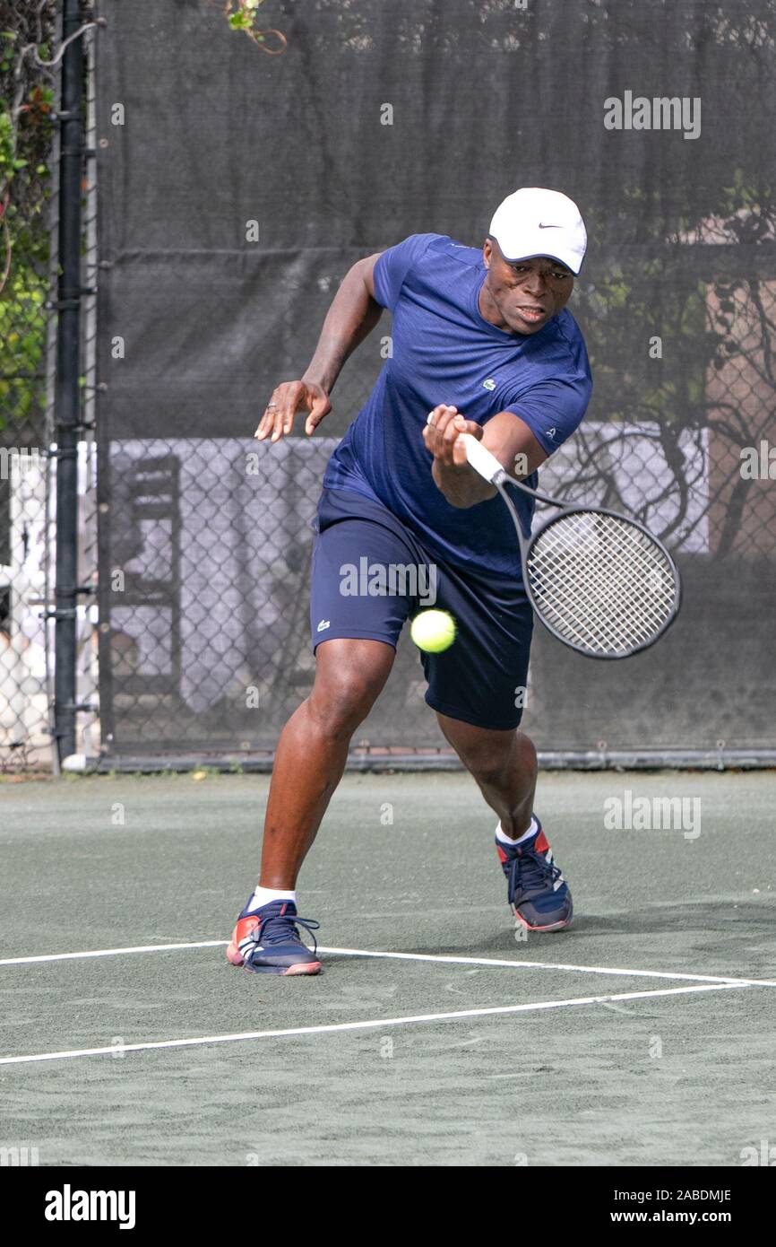 Seal playing at the Chris Evert Pro Celebrity Tennis Classic in Boca ...