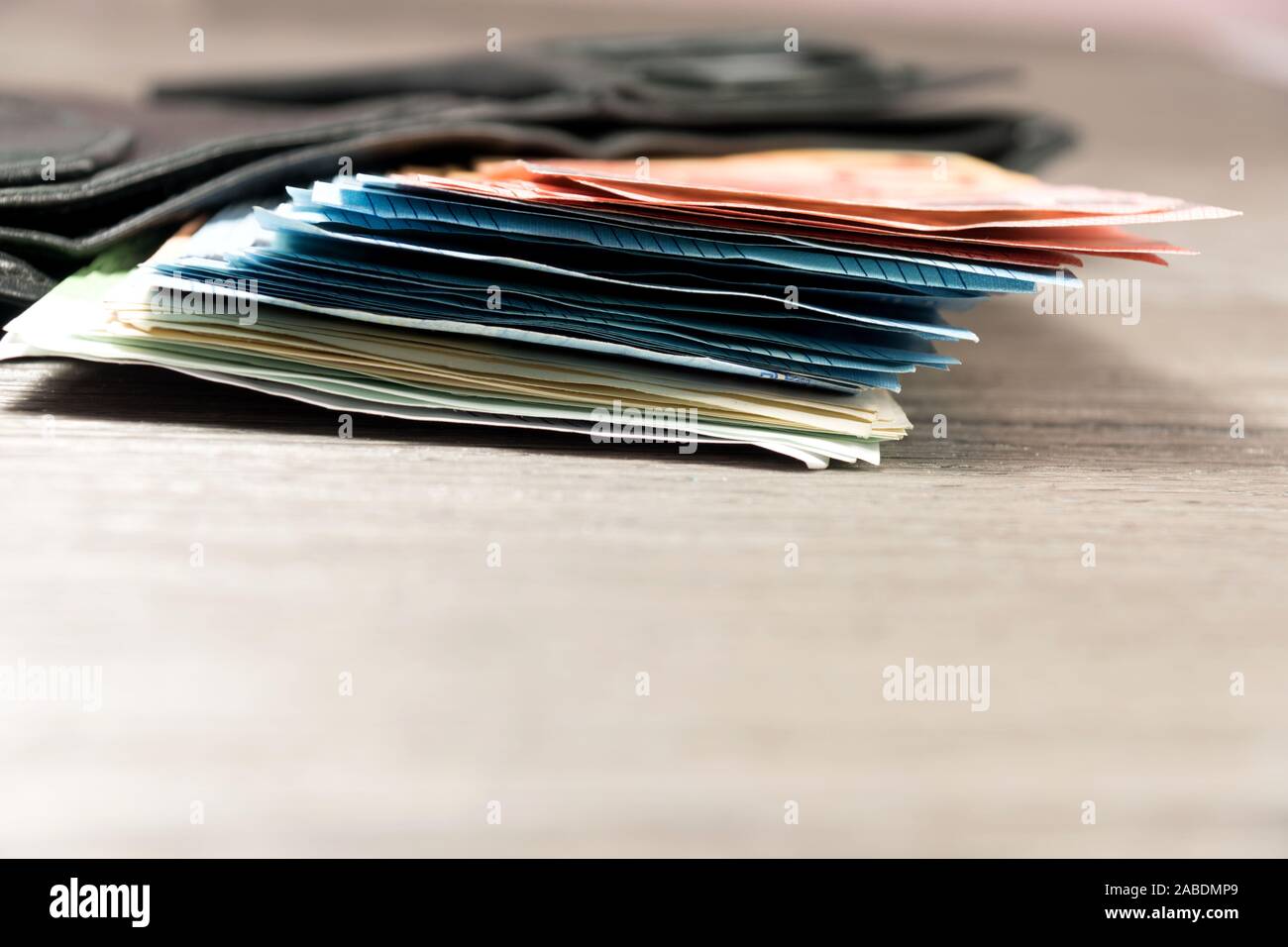 Wallet and Euro bills Stock Photo - Alamy
