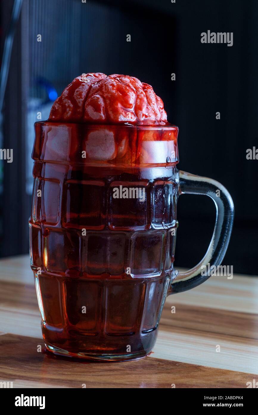 Human brain in beer mug soaking for alcoholism addiction concept Stock ...