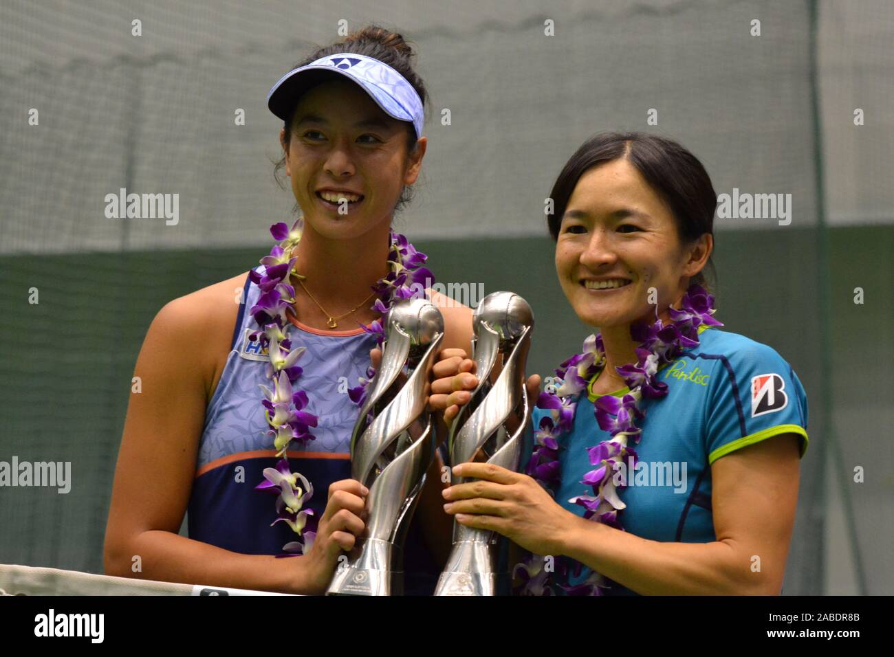 Japanese professional tennis player Shuko Aoyama, right, and Japanese ...