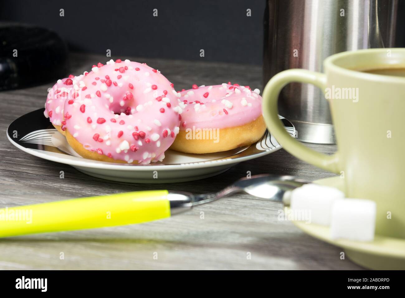 Coffee and donuts for breakfast Stock Photo - Alamy