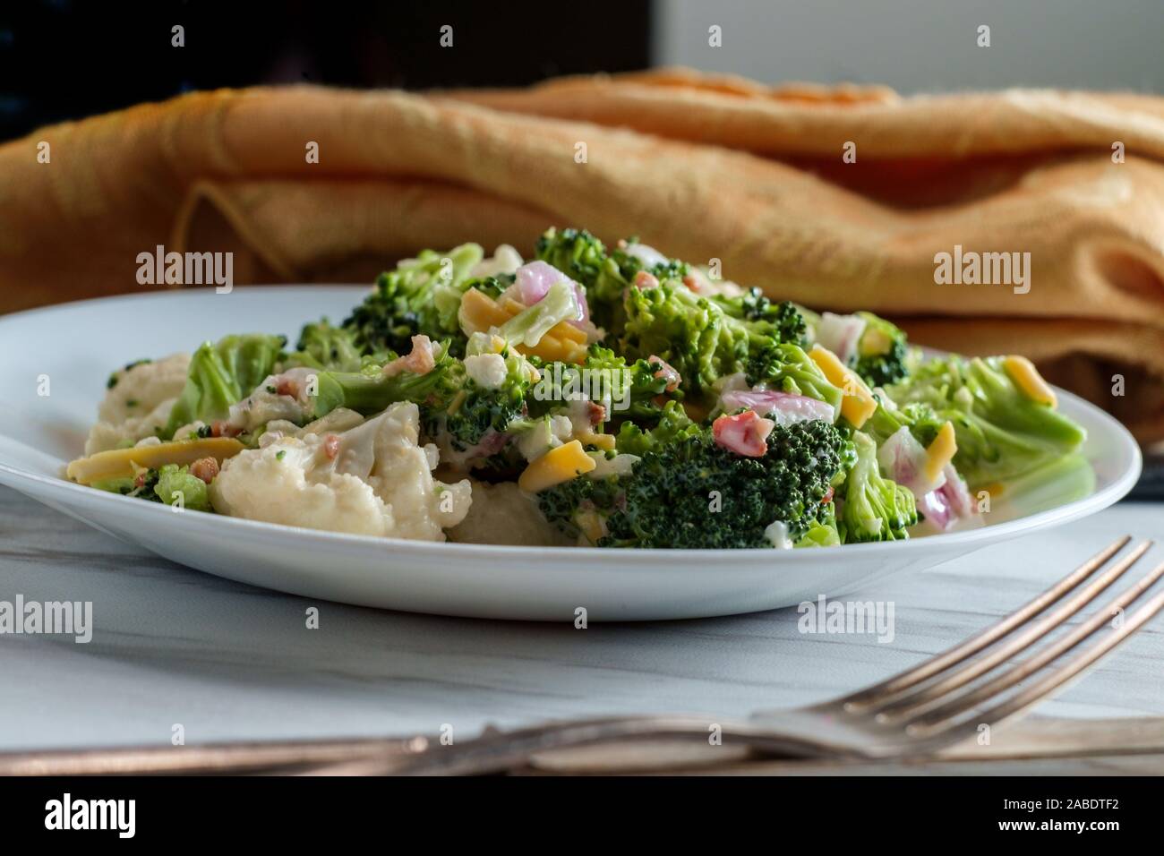 Broccoli and cauliflower bound salad with mayonnaise dressing Stock ...