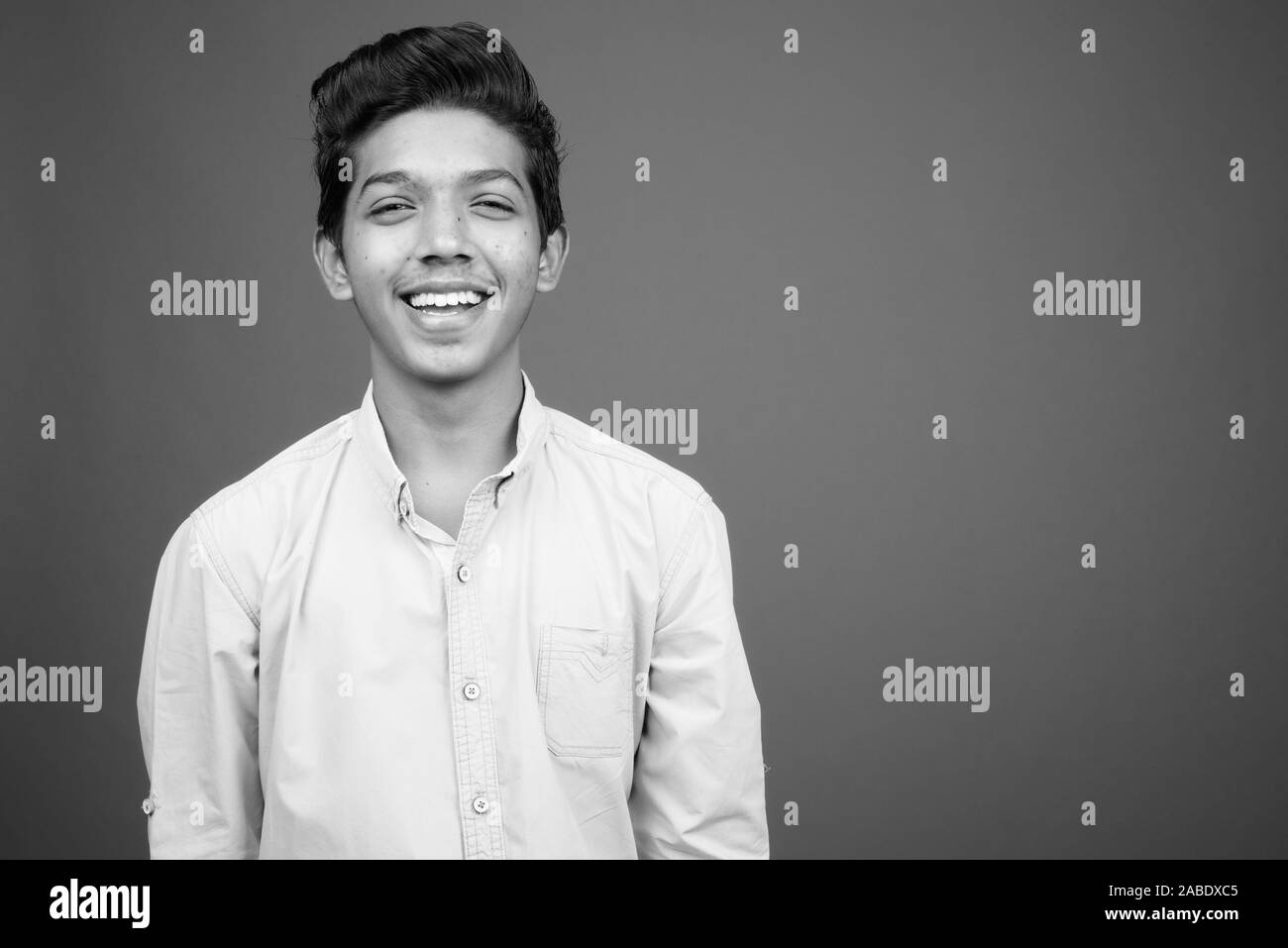 Young Indian boy looking smart in black and white Stock Photo - Alamy