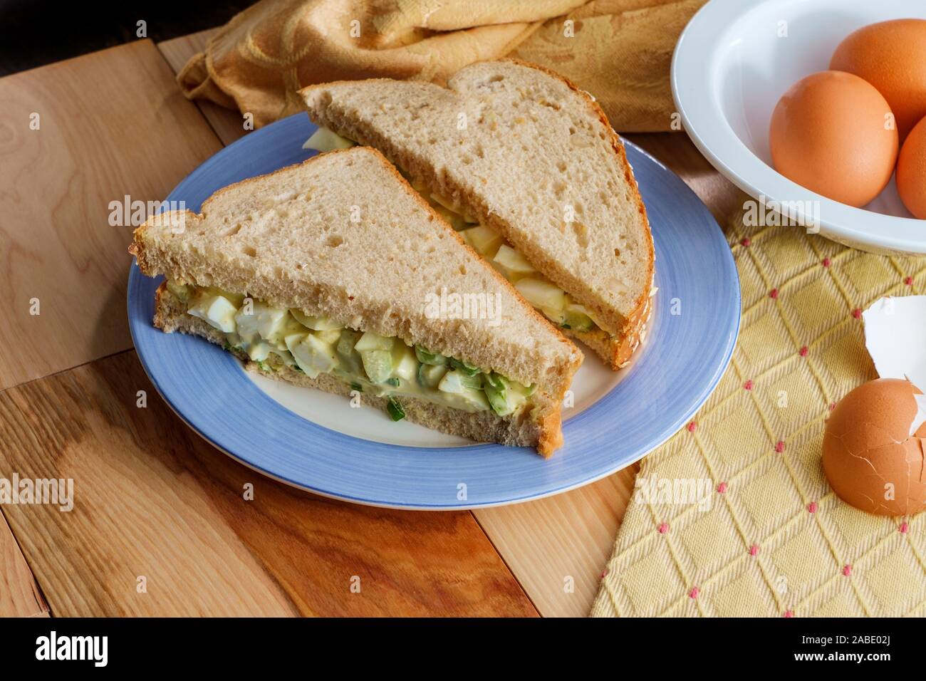 American egg salad mayonnaise sandwich on triangle sliced multigrain ...
