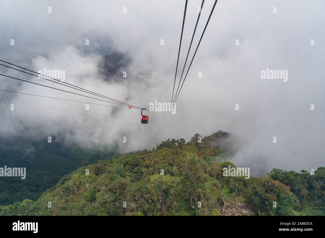 Cable car lane in high mountain in clouds. Fansipan, Vietnam Stock ...