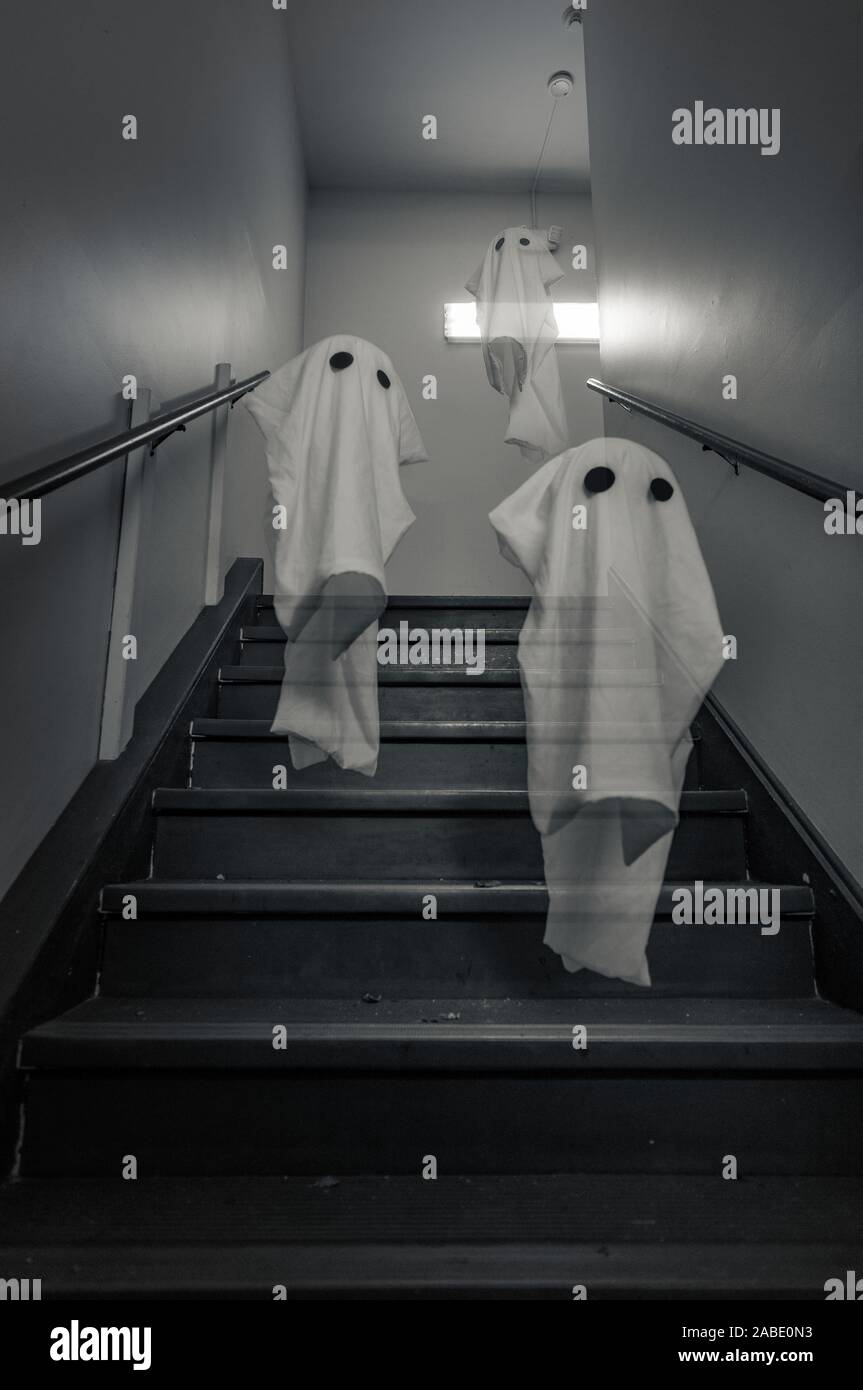 Spooky Halloween ghost spirits floating in the air Stock Photo - Alamy