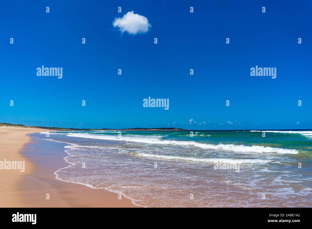 Beach shore with sand and mild waves. Beach vacation, getaway ...