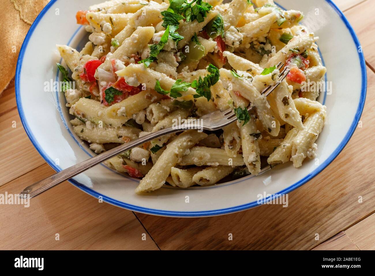 Greek penne Aegean pasta salad with crumbled feta cheese Stock Photo ...