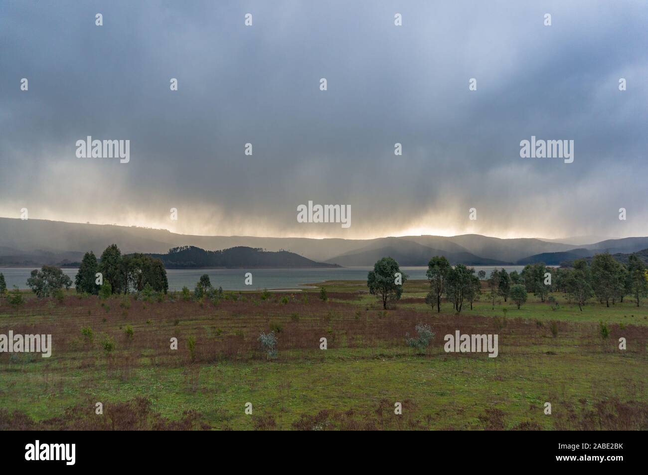 Extreme weather background of heavy rain, storm over rural landscape ...