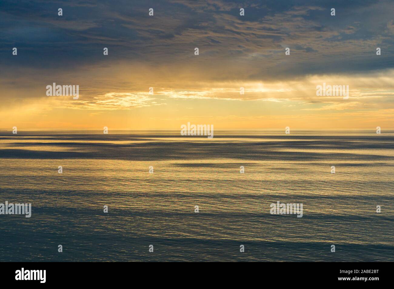 Spectacular sunset seascape with dramatic sky and colorful water Stock ...