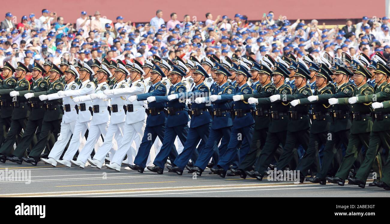 Soldiers, sailors and pilots of various troops line up and proceed ...