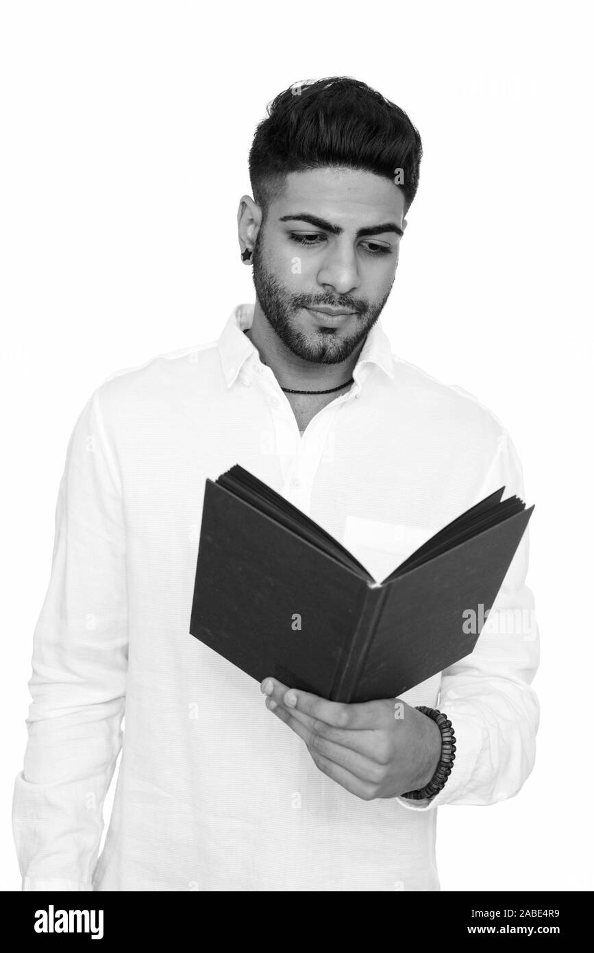 Indian man reading hi-res stock photography and images - Alamy