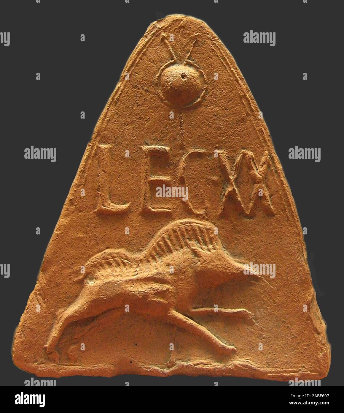 6533. Roman roof tile antefix inscribed ‘Twentieth Legion’, depicting a ...