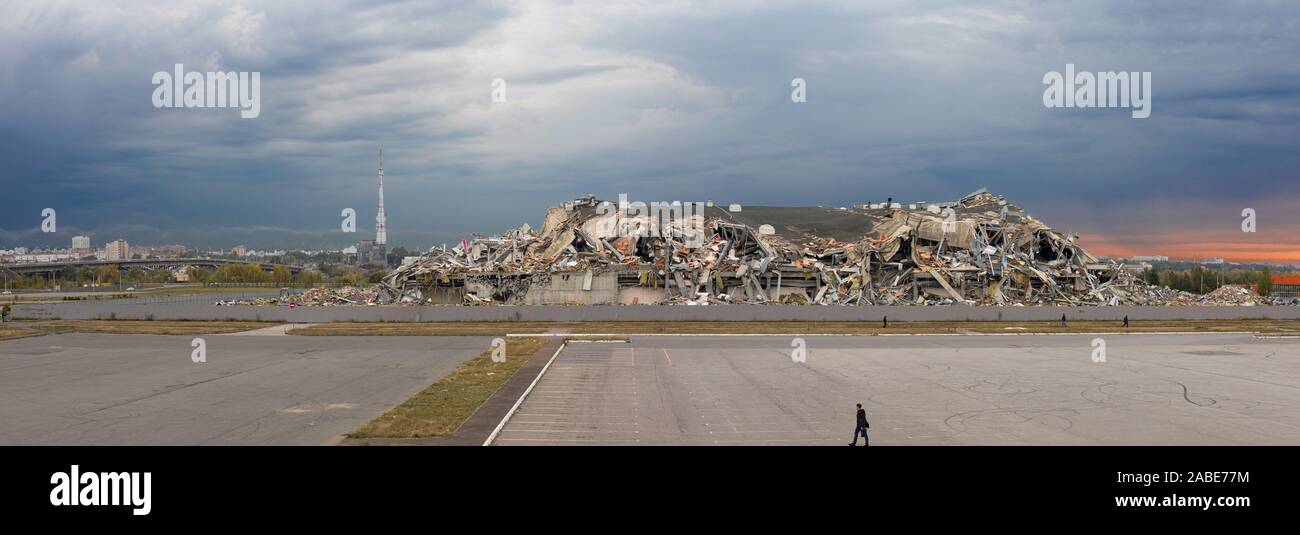 Demolition of buildings in urban environments. Disaster scene full of ...