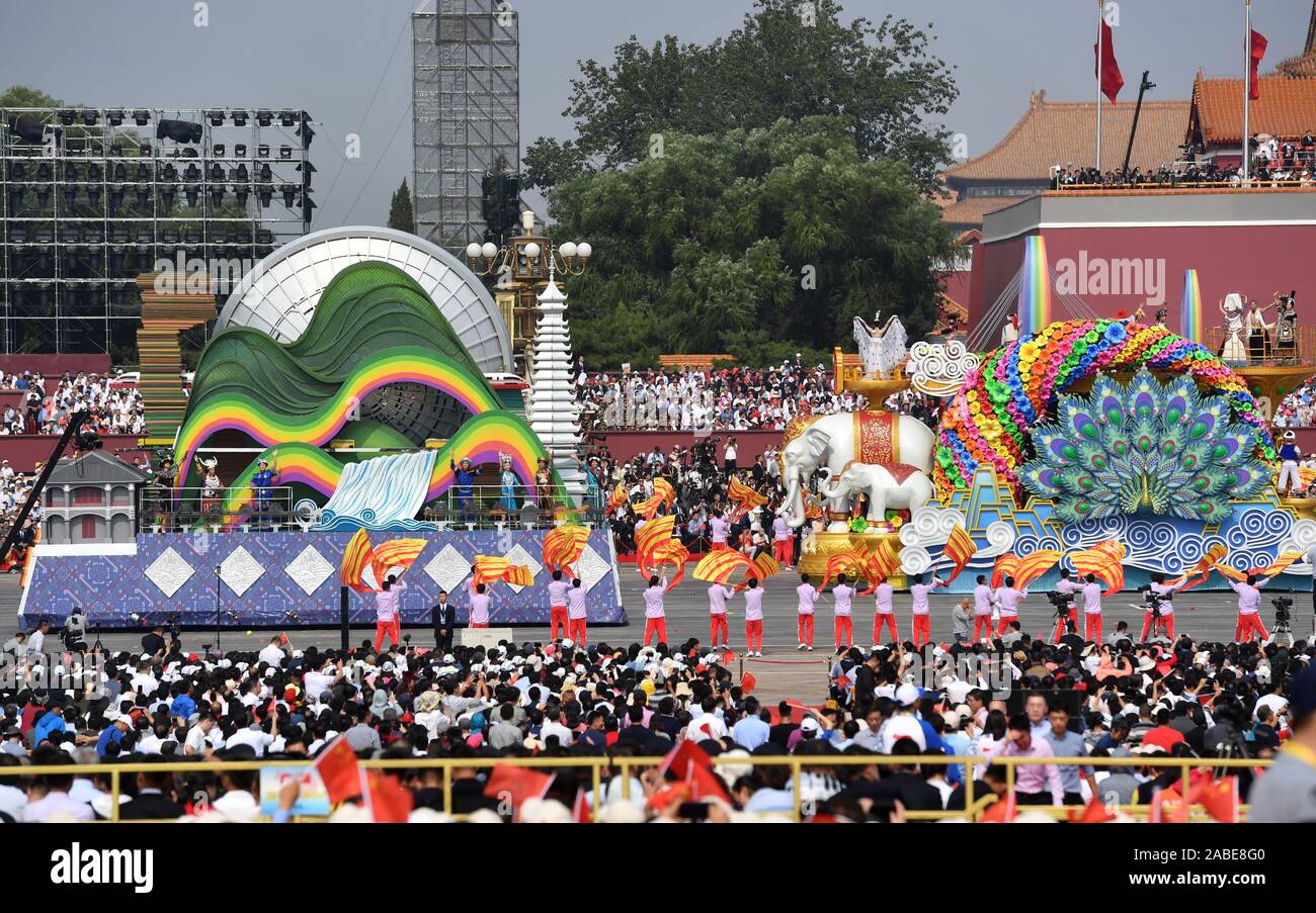 Floats of different cities and provinces pass by Tian'anmen Square ...