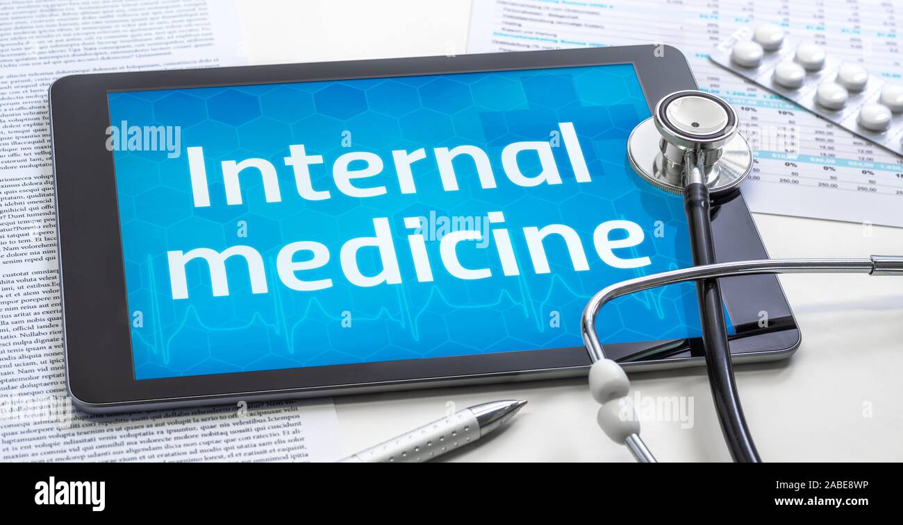 The word Internal medicine on the display of a tablet Stock Photo - Alamy