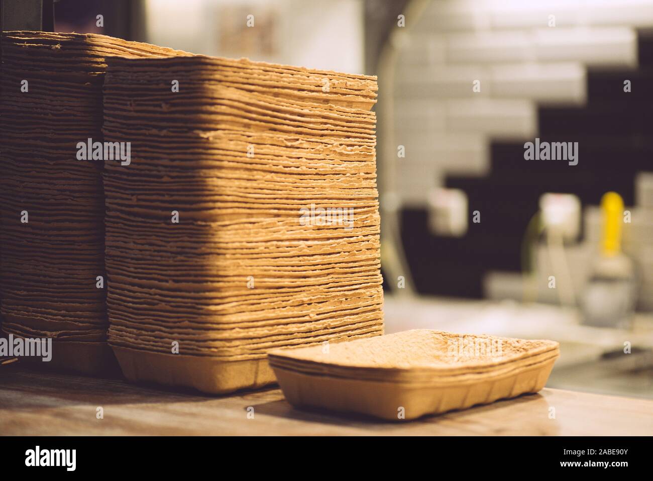 Recycled paper utensils in the kitchen of a street food restaurant ...