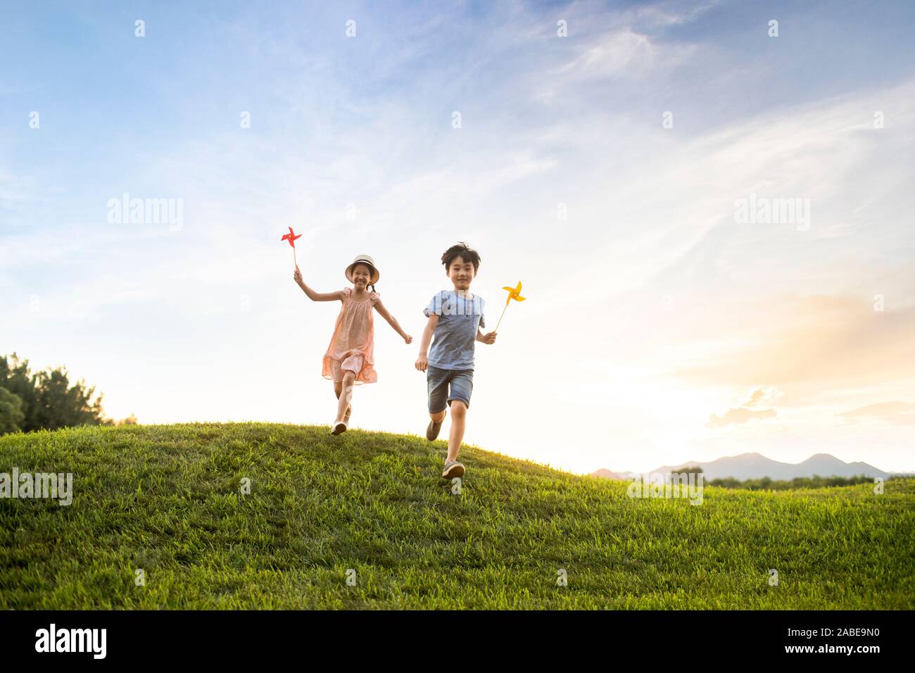 Child nature windmill hi-res stock photography and images - Alamy