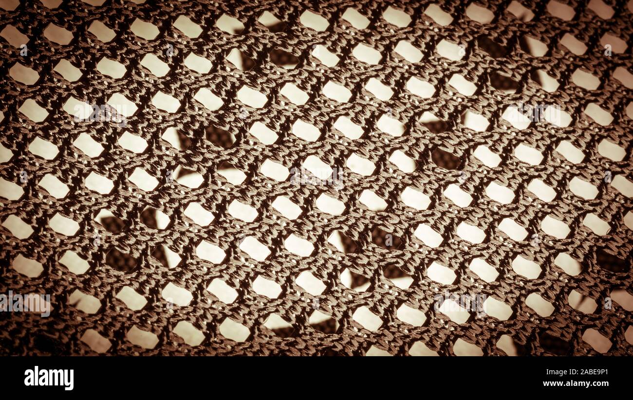 Chocolate handmade crochet cloth mesh pattern texture close up ...