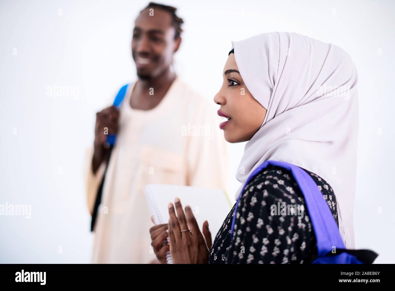 group of happy african students having conversation and team meeting ...