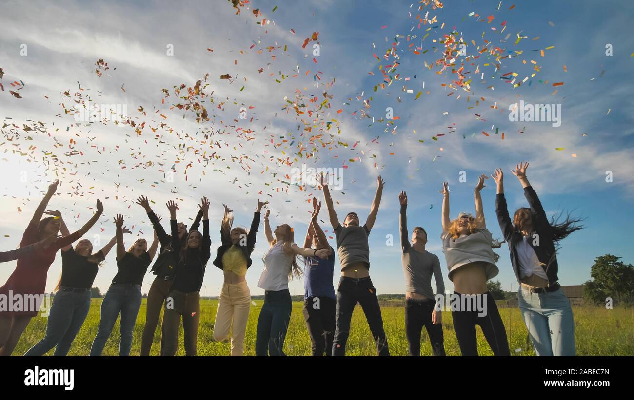 Group confetti toss hi-res stock photography and images - Alamy