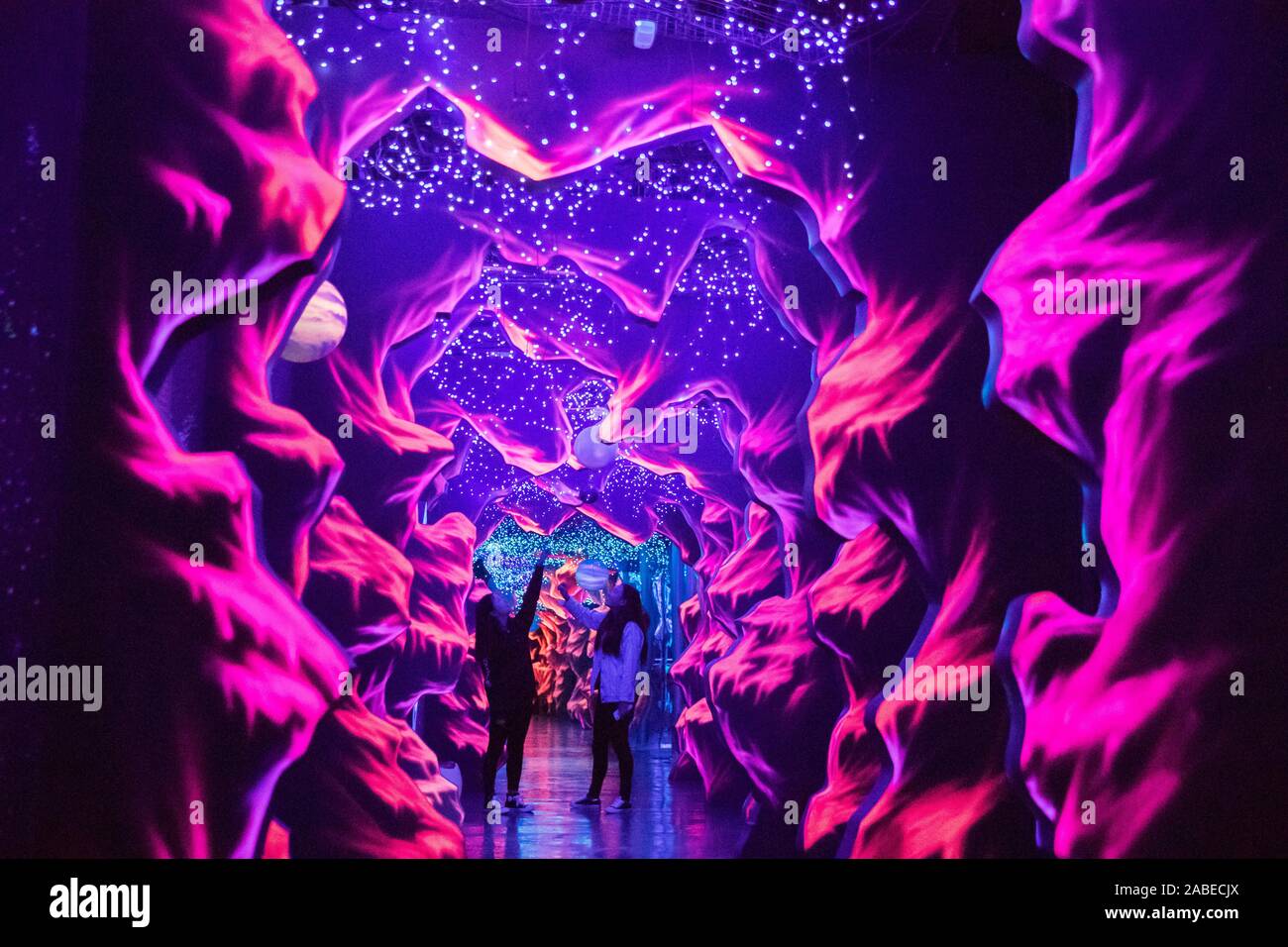 Tourists stroll and observe at a newly opened museum of constellation ...