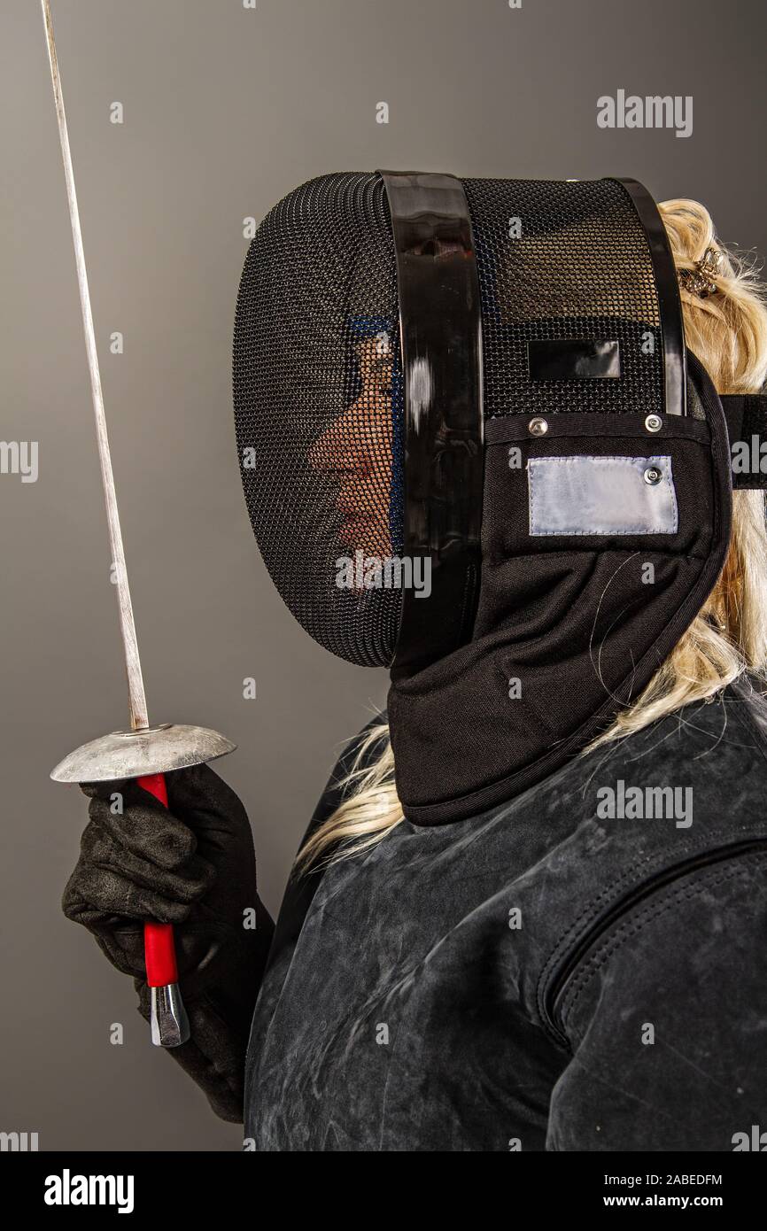Black woman holding rapier sword hi-res stock photography and images ...