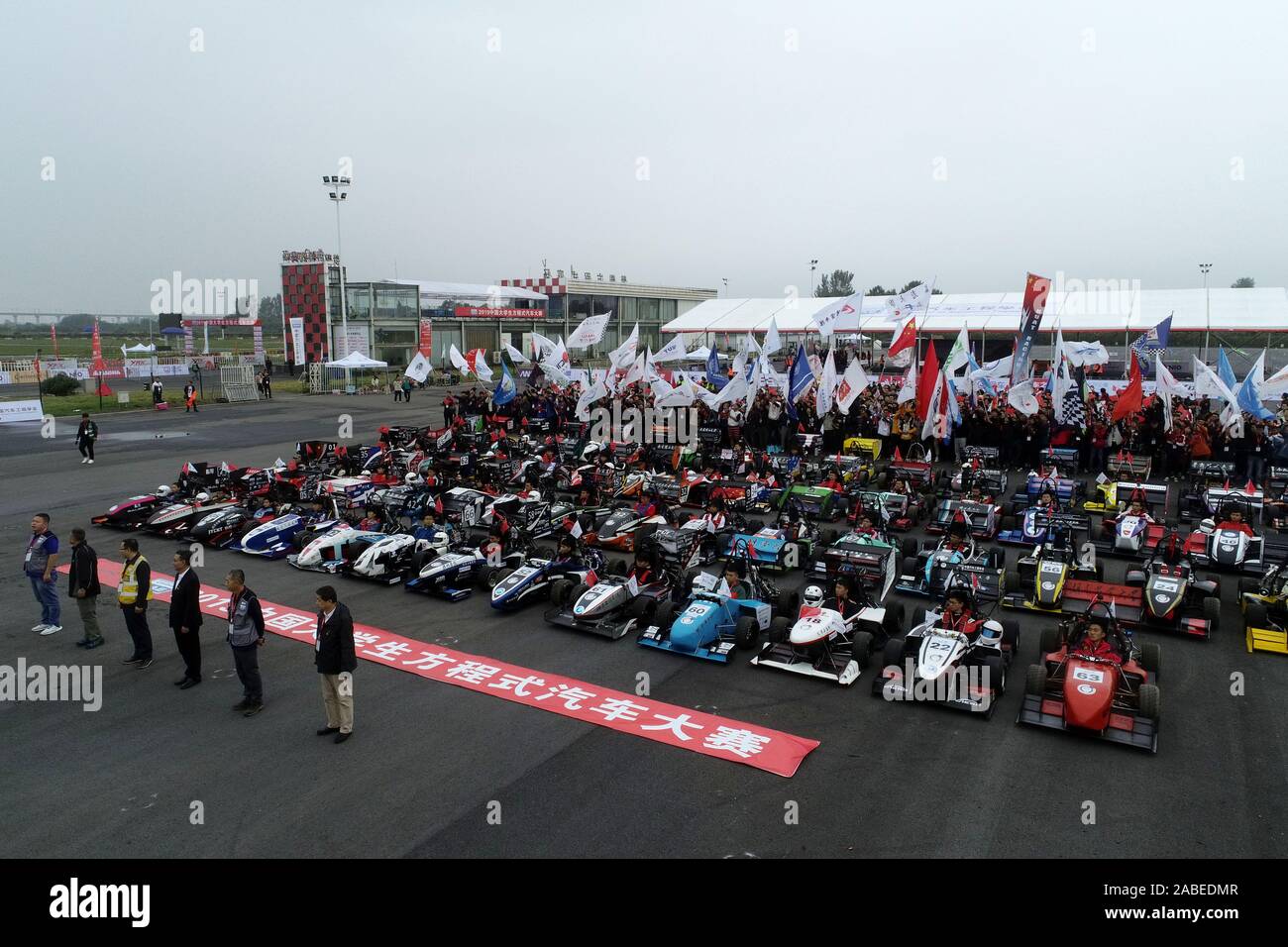 Participated students and their self-produced formulas prepare for the ...