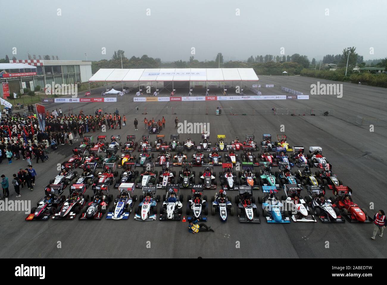 Participated students and their self-produced formulas prepare for the ...