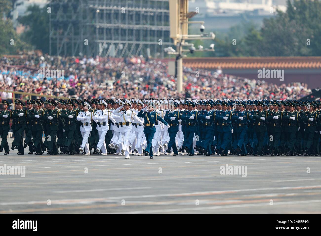 Soldiers, sailors and pilots of various troops line up and proceed ...
